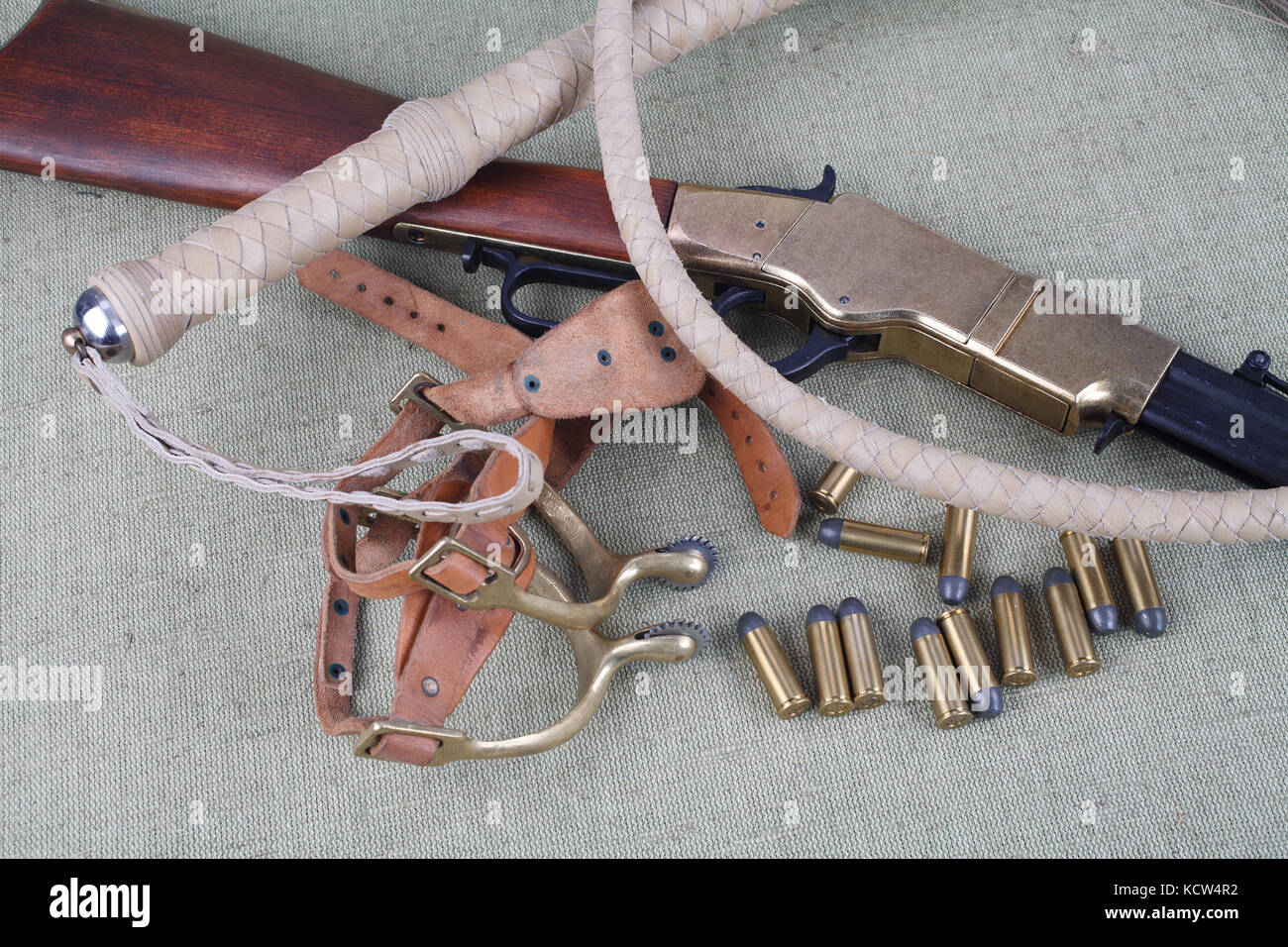 Wild west rifle and ammunition Stock Photo - Alamy