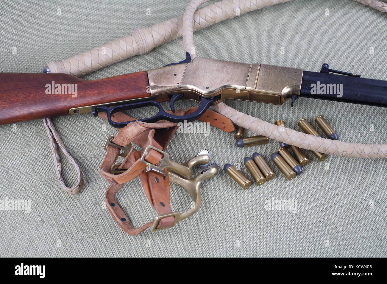 Wild west rifle and ammunition Stock Photo - Alamy