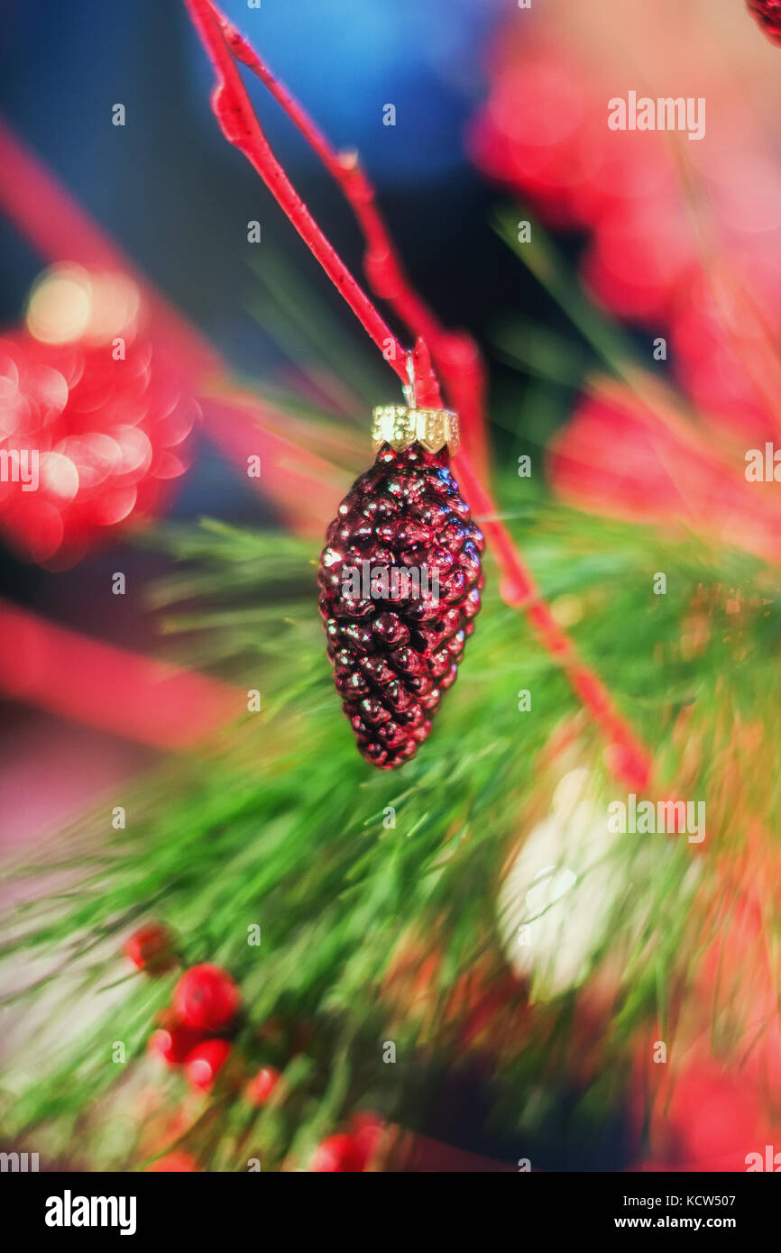 Decorative red branches with red berries decorated with Christmas ...