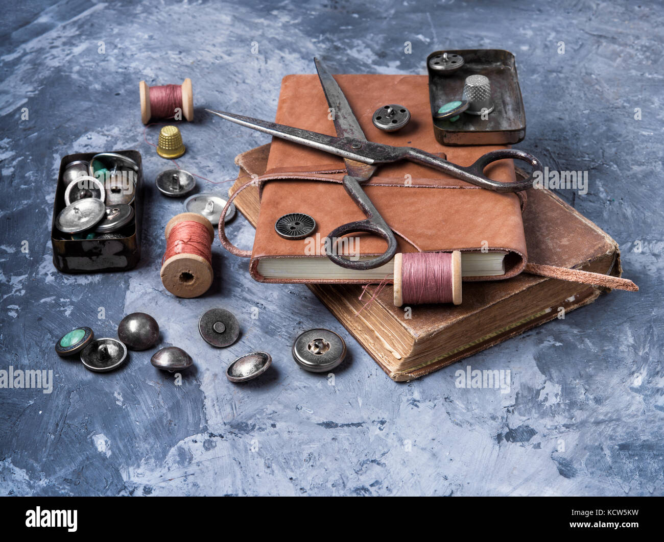 retro buttons for clothes, scissors and sewing threads Stock Photo - Alamy