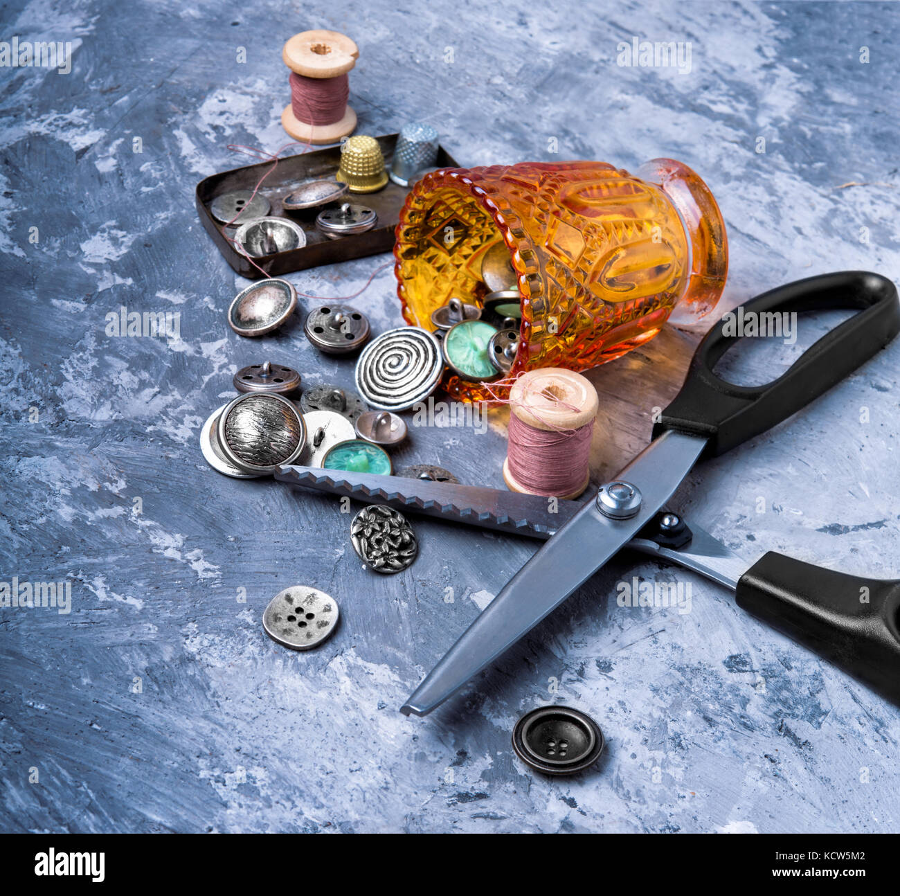retro buttons for clothes, scissors and sewing threads Stock Photo - Alamy