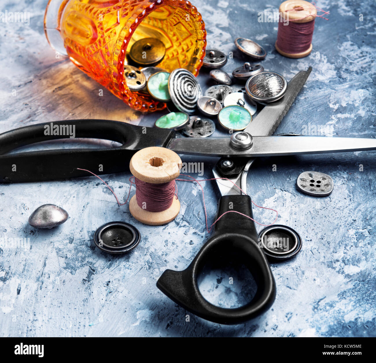 retro buttons for clothes, scissors and sewing threads Stock Photo - Alamy