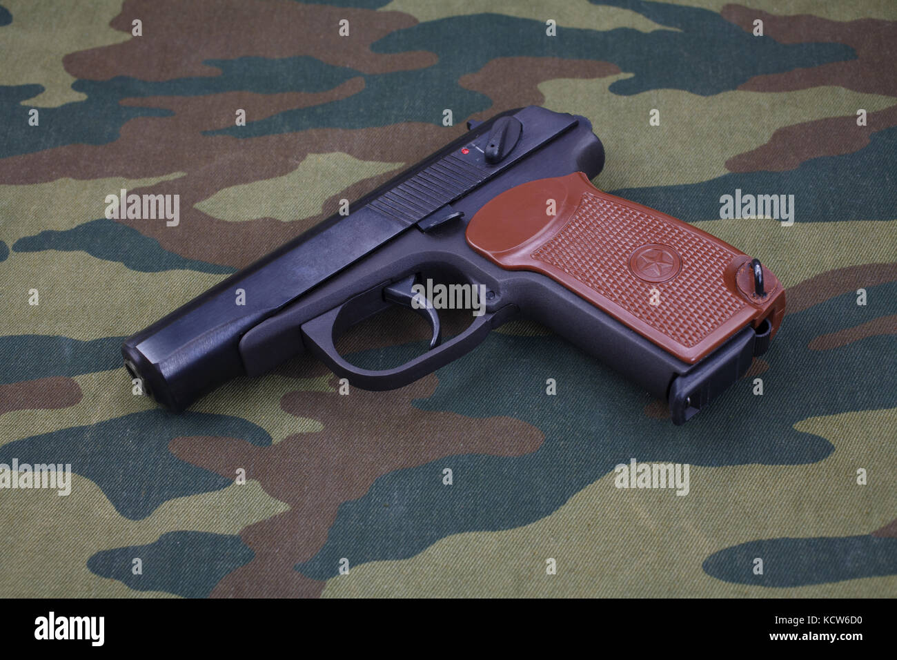 9mm russian handgun on russian camouflage uniform Stock Photo - Alamy