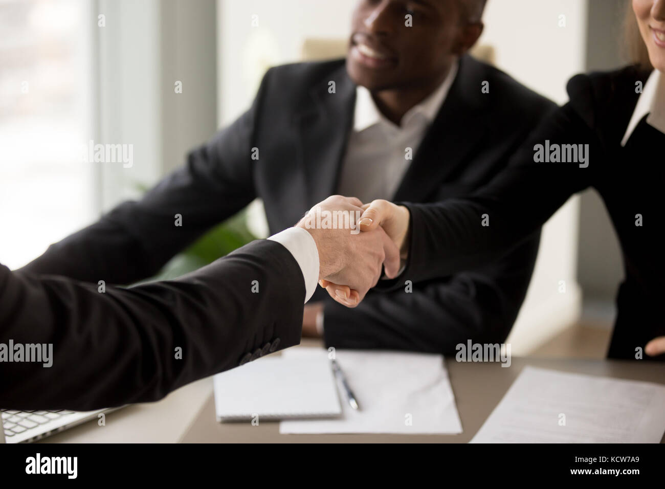 Close up image of business handshake between caucasian businesswoman ...
