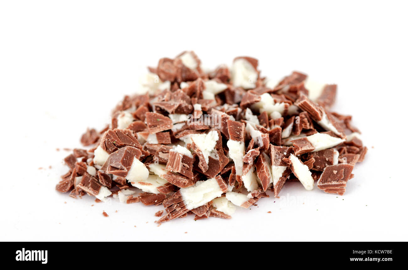 picture of a small pieces of a milk chocolate on white background Stock ...