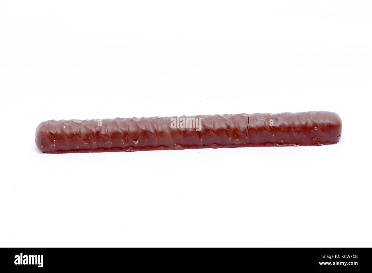 picture of a long chocolate bar on white background Stock Photo - Alamy