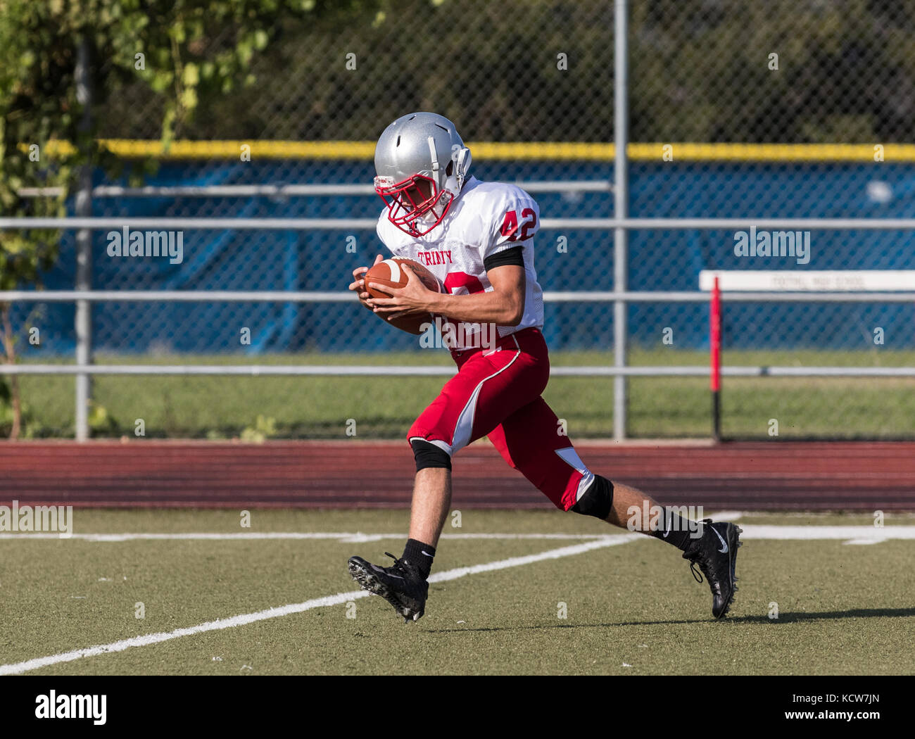 Football action with Trinity vs. University Prep High School in Redding ...