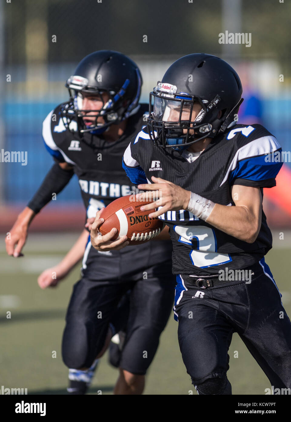 Football action with Trinity vs. University Prep High School in Redding ...