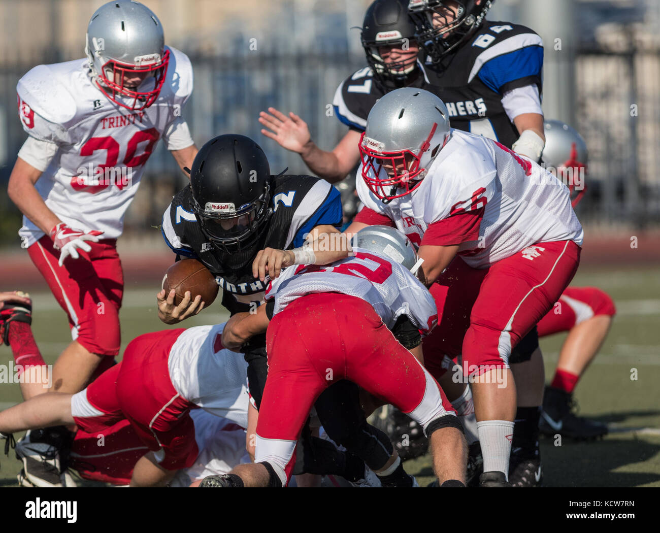 Football action with Trinity vs. University Prep High School in Redding ...