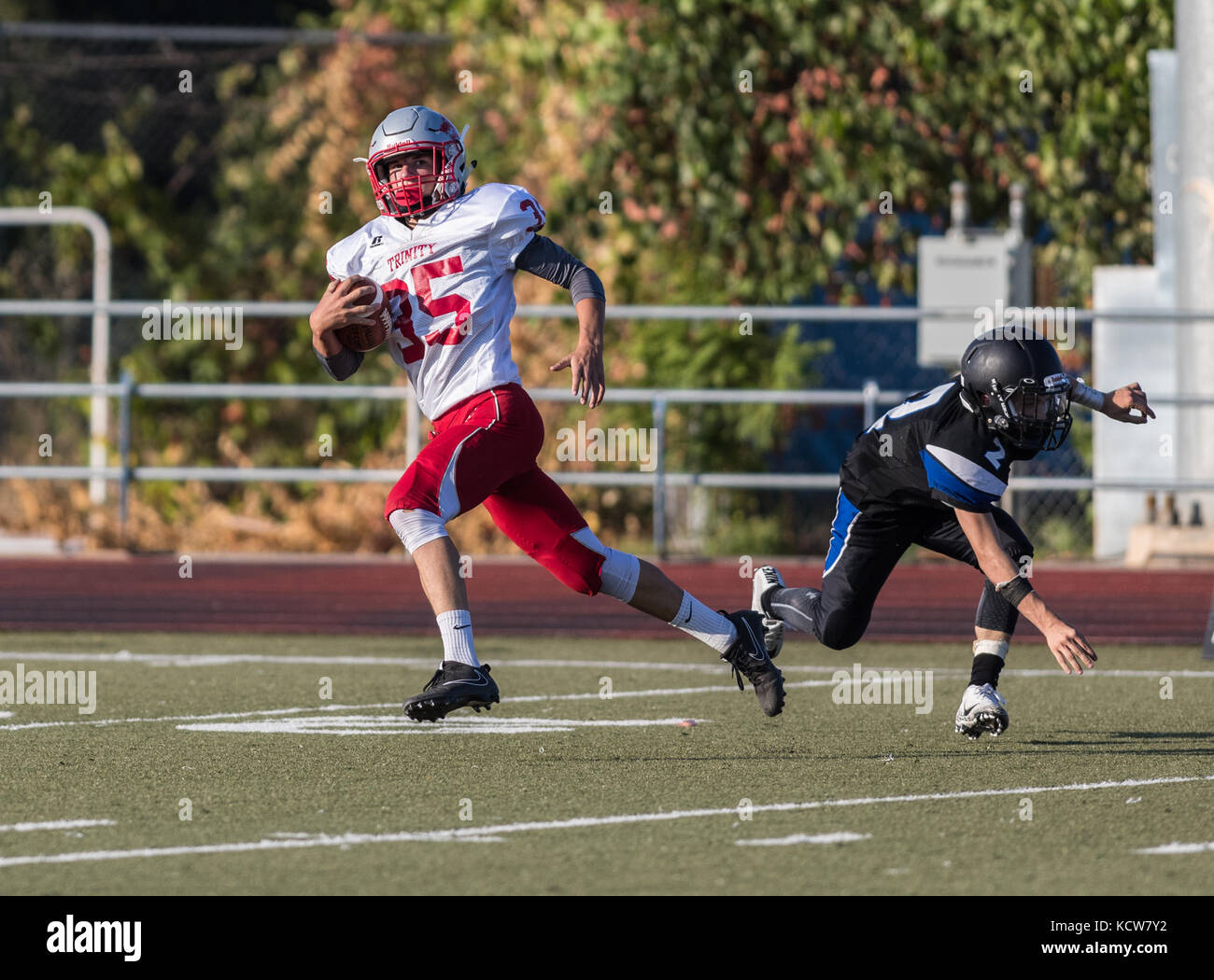 Football action with Trinity vs. University Prep High School in Redding ...