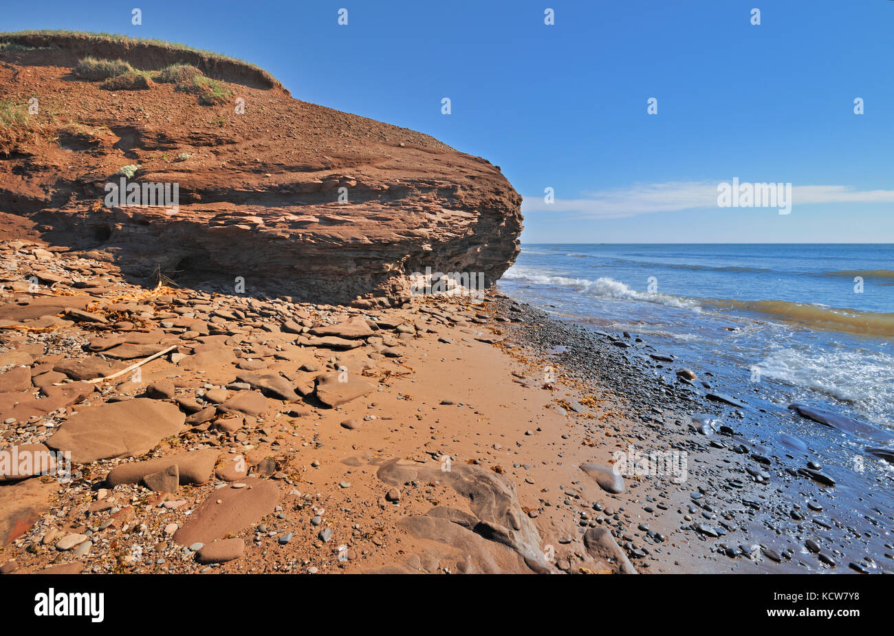 Waves lapping up on a beach, Lamèque Island, New Brunswick, Canada ...