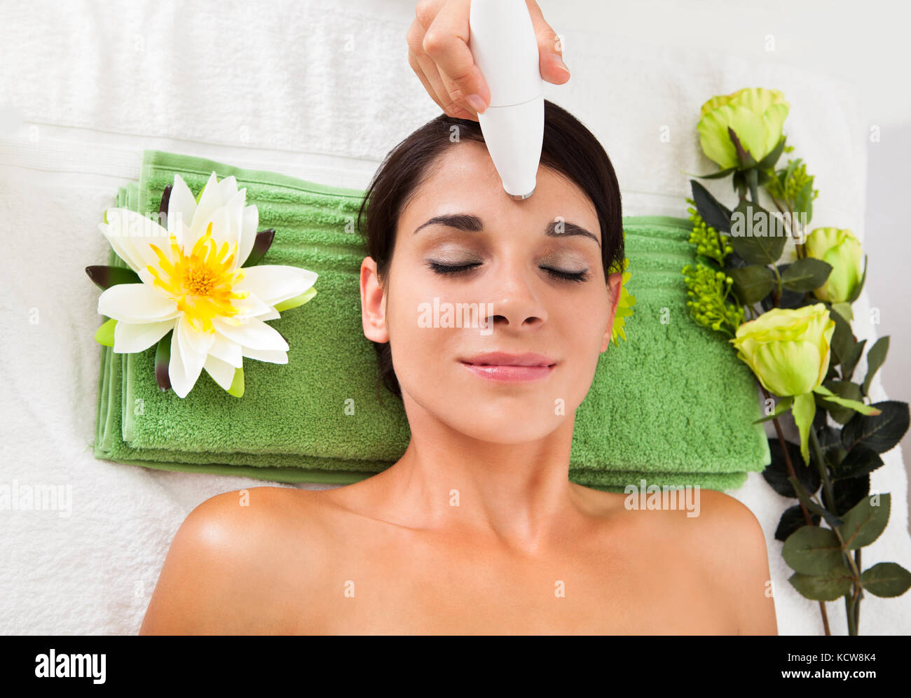 Young Woman Getting A Face Treatment In A Beauty Spa Stock Photo - Alamy