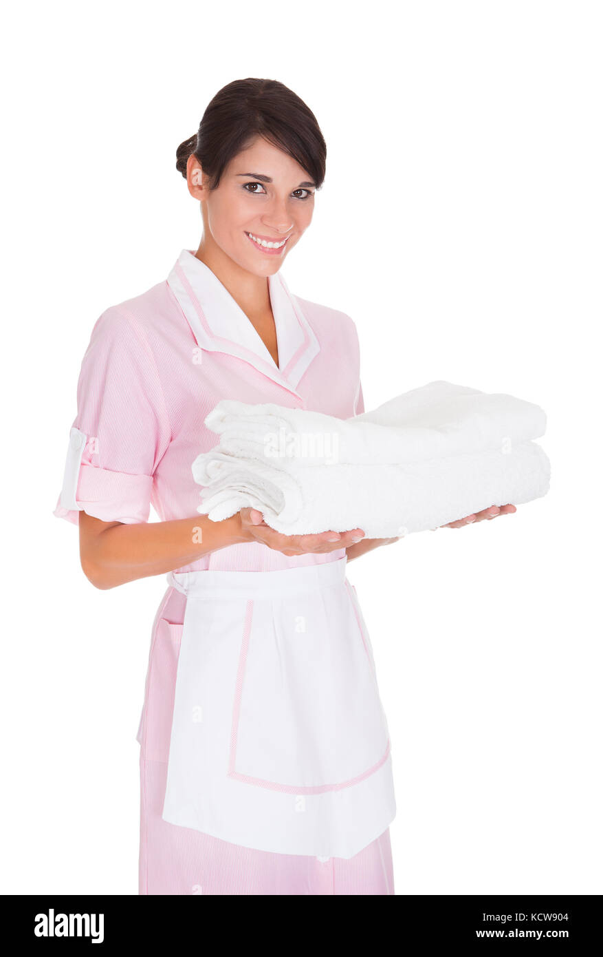 Happy Female Maid Holding Stack Of White Towels Over White Background ...