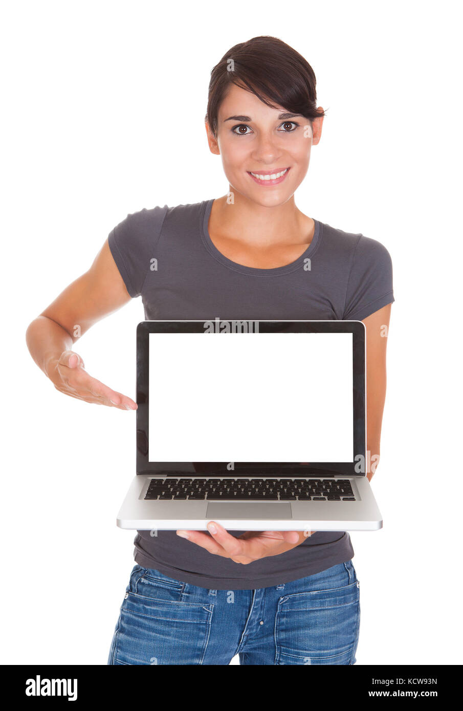 Young Happy Woman Holding Laptop Over White Background Stock Photo - Alamy