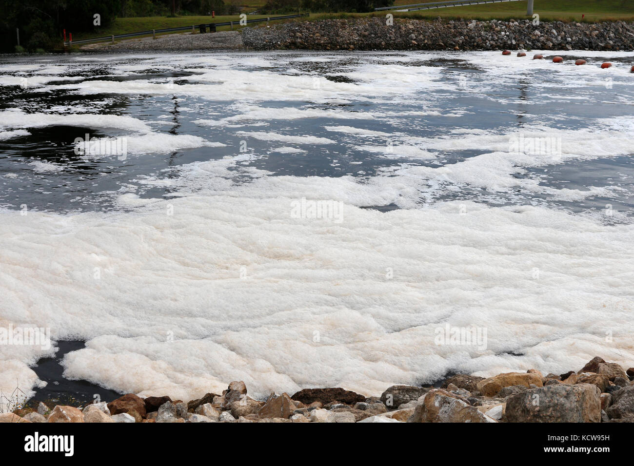 Foam on the surface of a river Stock Photo - Alamy