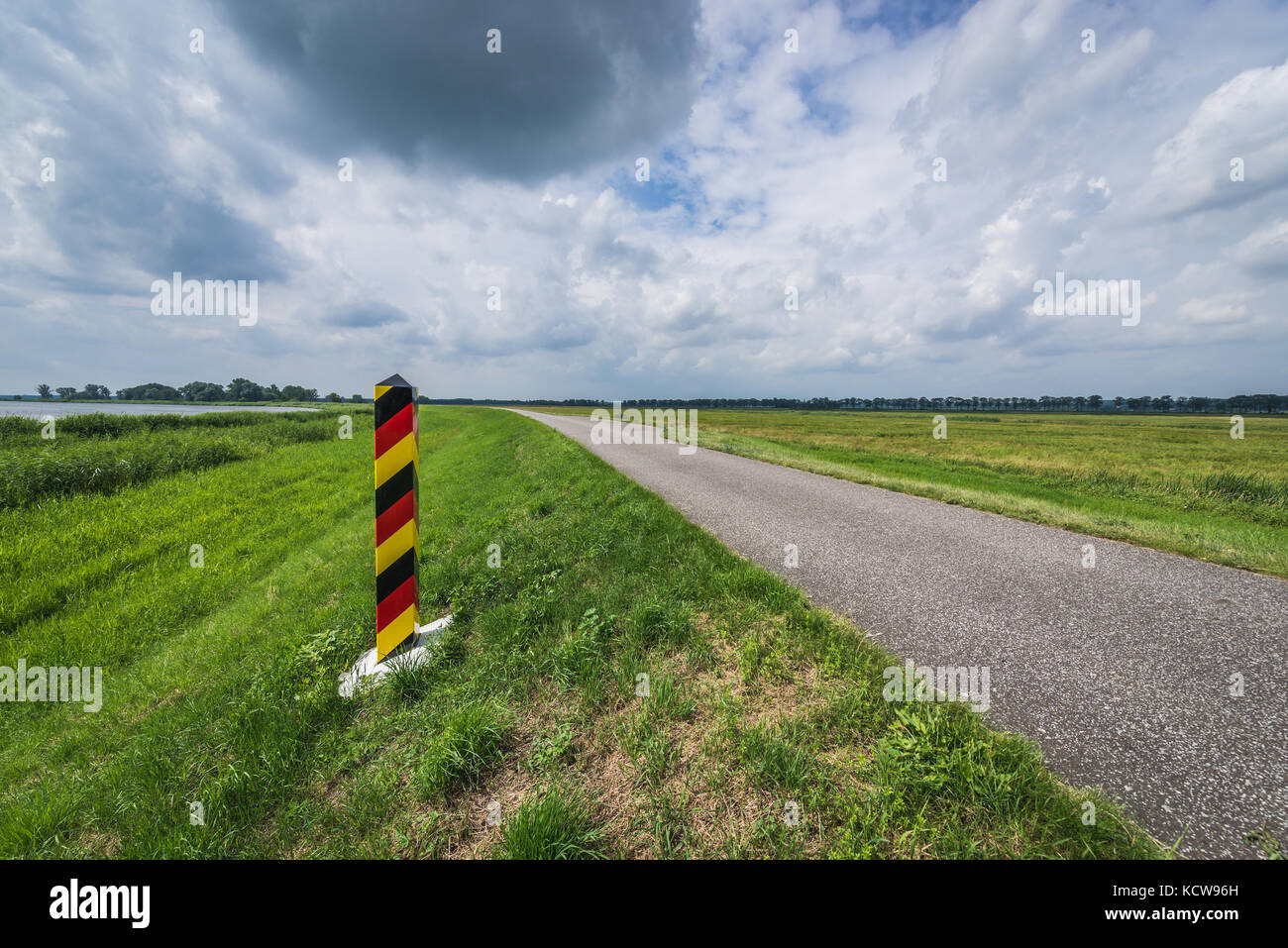 German boundary marker next to path in Lower Oder Valley National Park ...