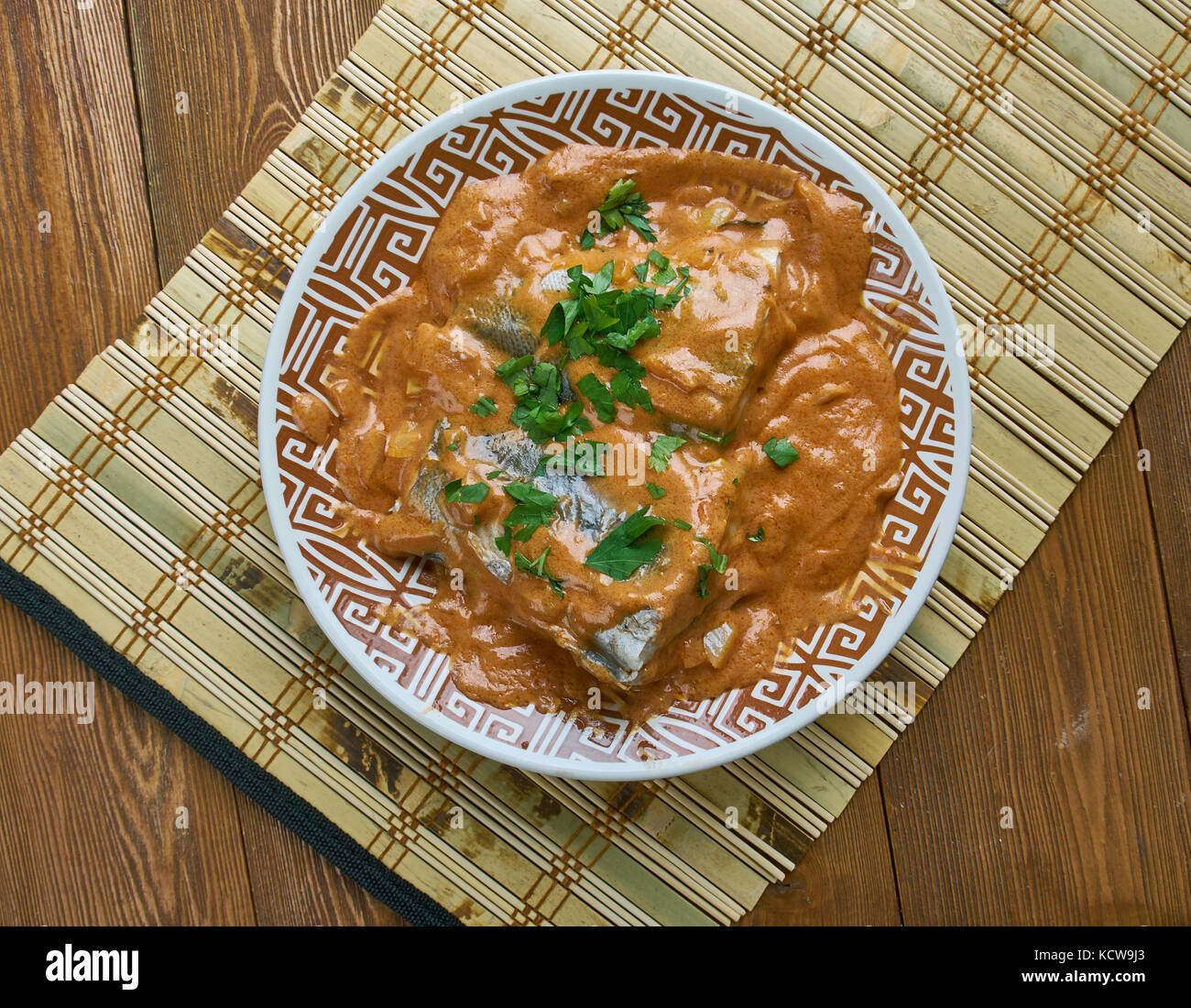 Plachie din peste - fried fish in sauce.Romanian cuisine Stock Photo ...