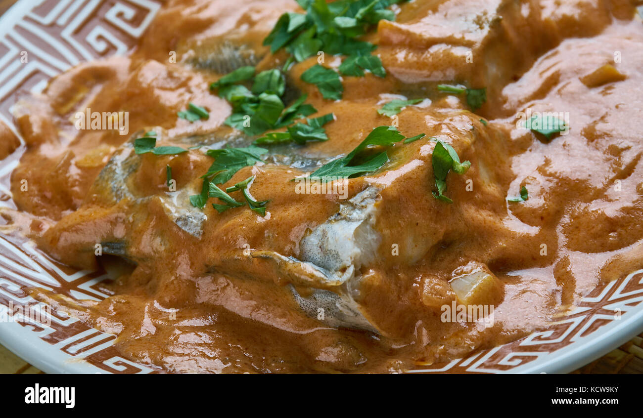 Plachie din peste - fried fish in sauce.Romanian cuisine Stock Photo ...