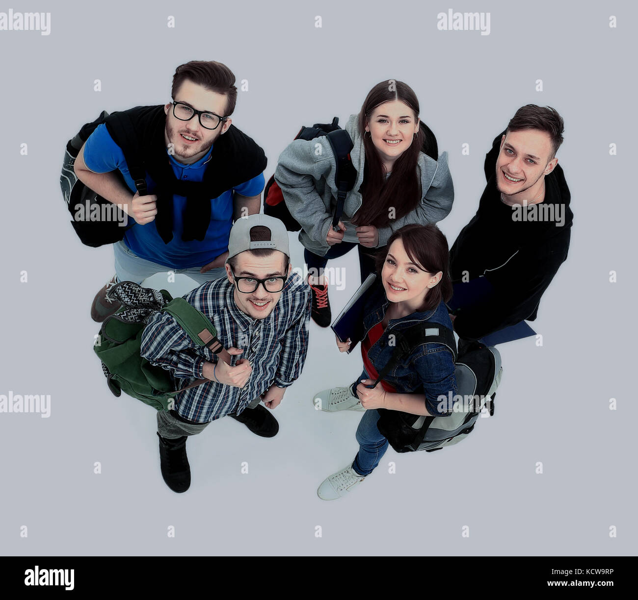 Top view. Happy smiling young group looking at camera Stock Photo - Alamy