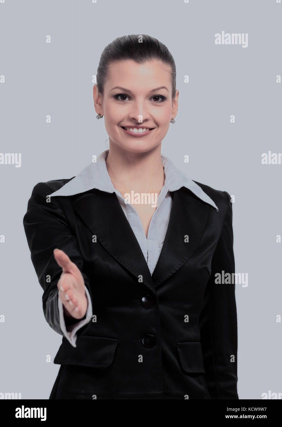 Happy businesswoman in suit giving hand for handshake Stock Photo - Alamy