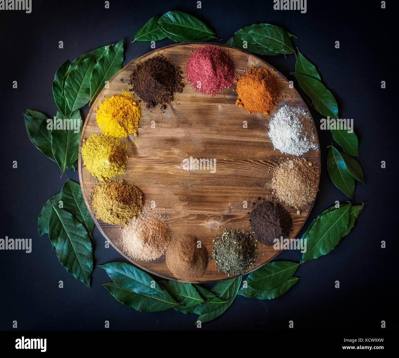 flat lay with fresh herbs and greenery for drying and making spices set ...
