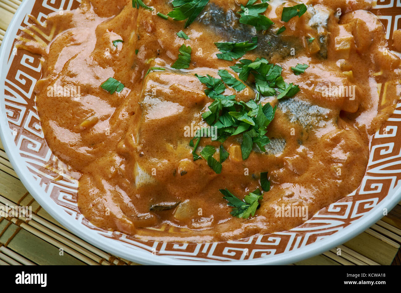 Plachie din peste - fried fish in sauce.Romanian cuisine Stock Photo ...