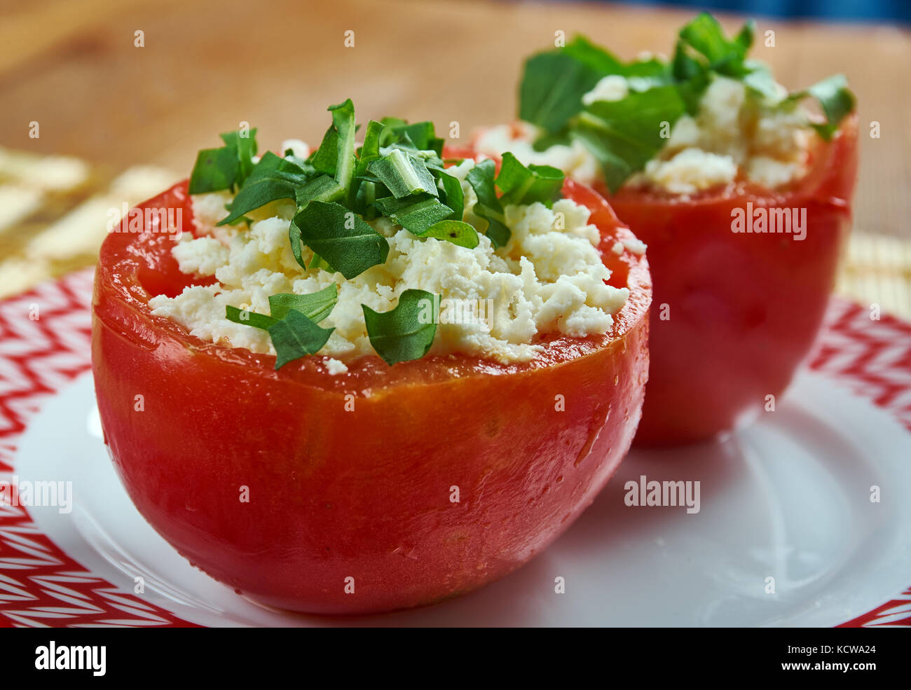 Domates Yemistes - Greek Stuffed Tomatoes with cheese and herbs Stock ...