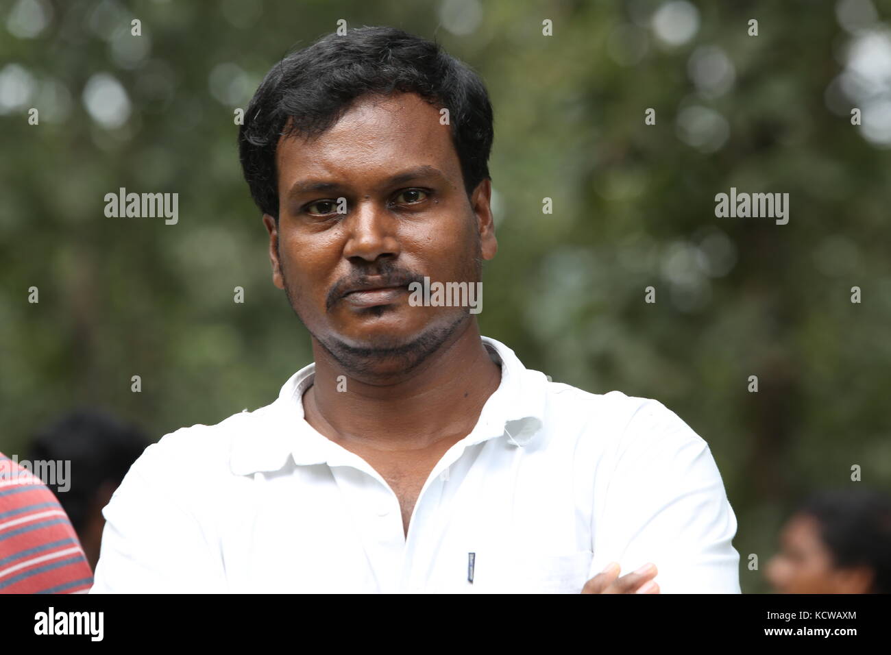 Emotions. Young sad man looking at camera, sad face Stock Photo - Alamy