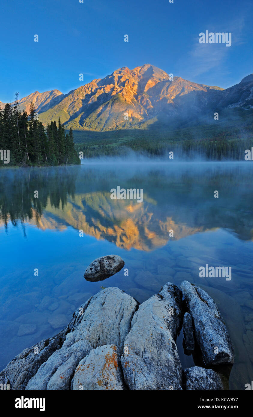 Pyramid Mountain reflected in Pyramid Lake at sunrise, Jasper National ...