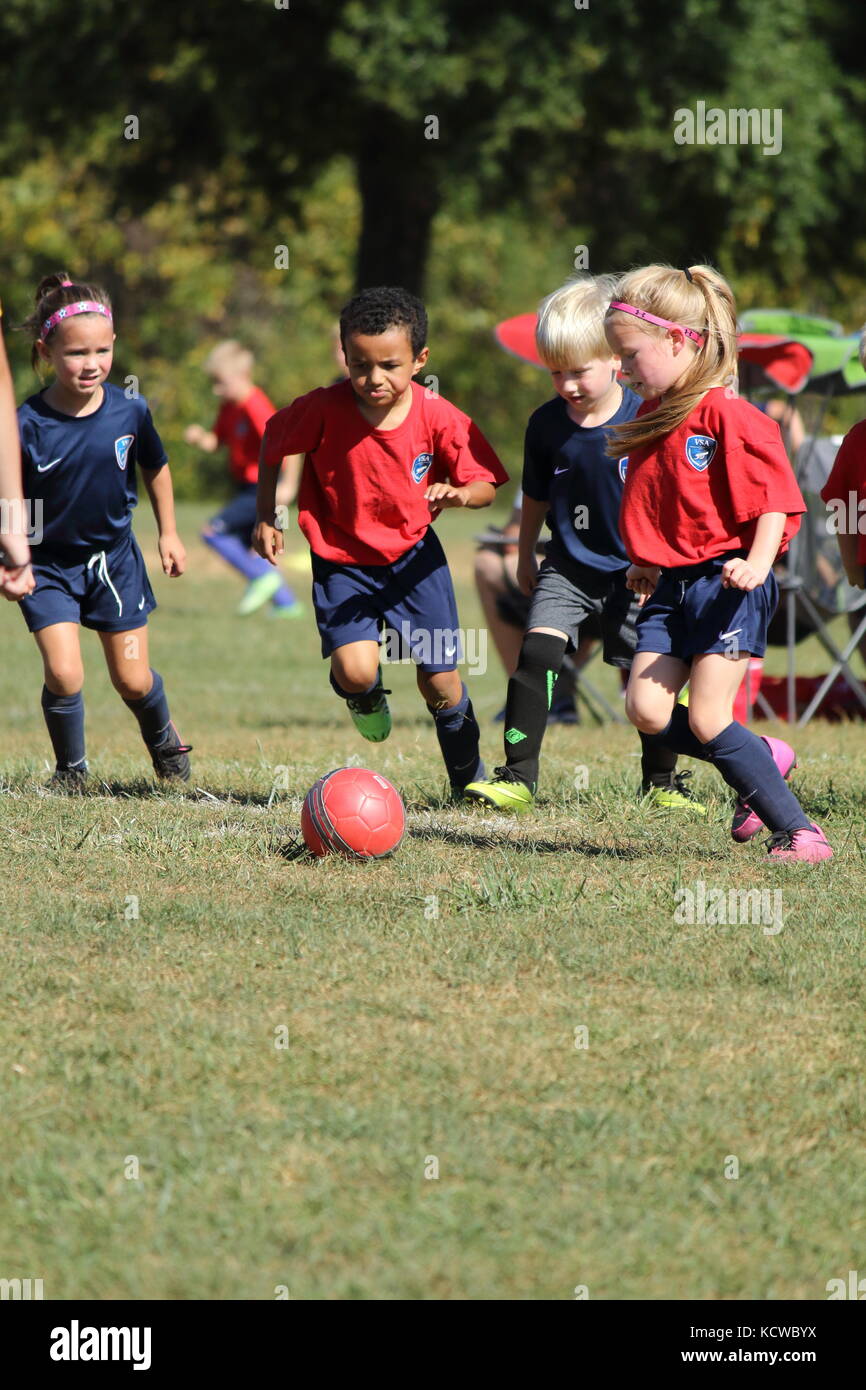 Children Running After Ball High Resolution Stock Photography and ...