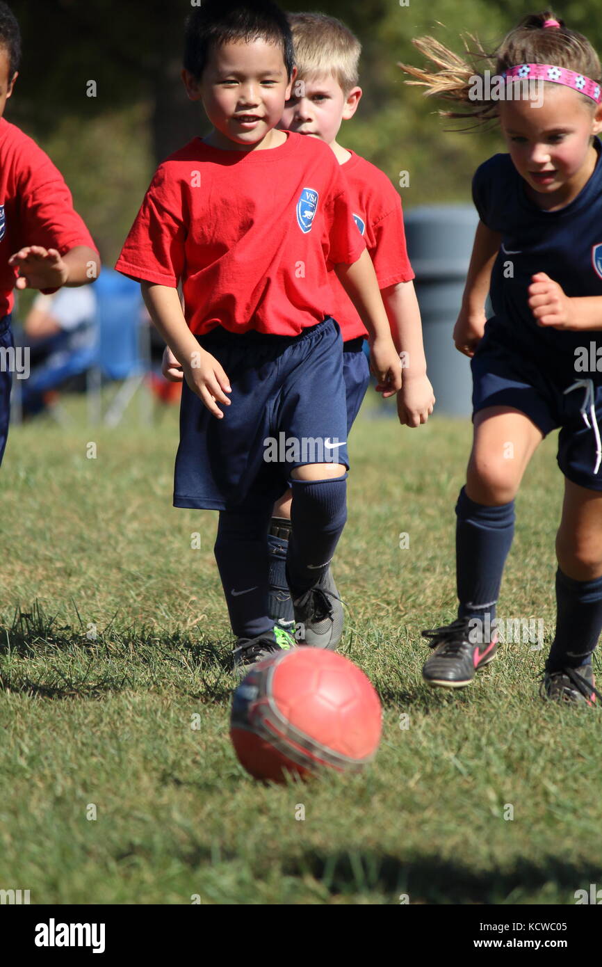 "I'm not let a girl beat me to the ball! Stock Photo - Alamy