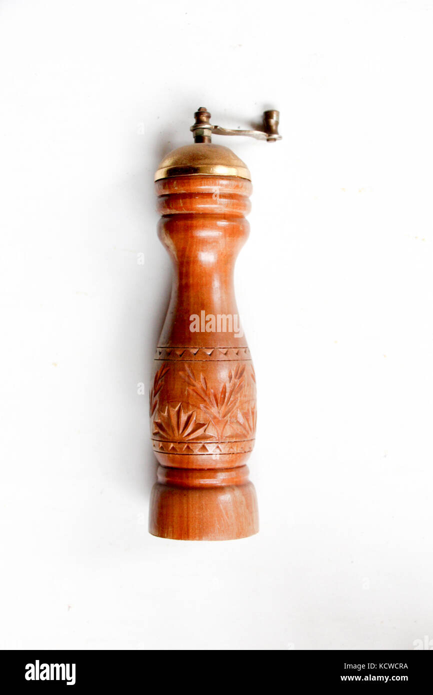 old pepper mill on white Stock Photo - Alamy