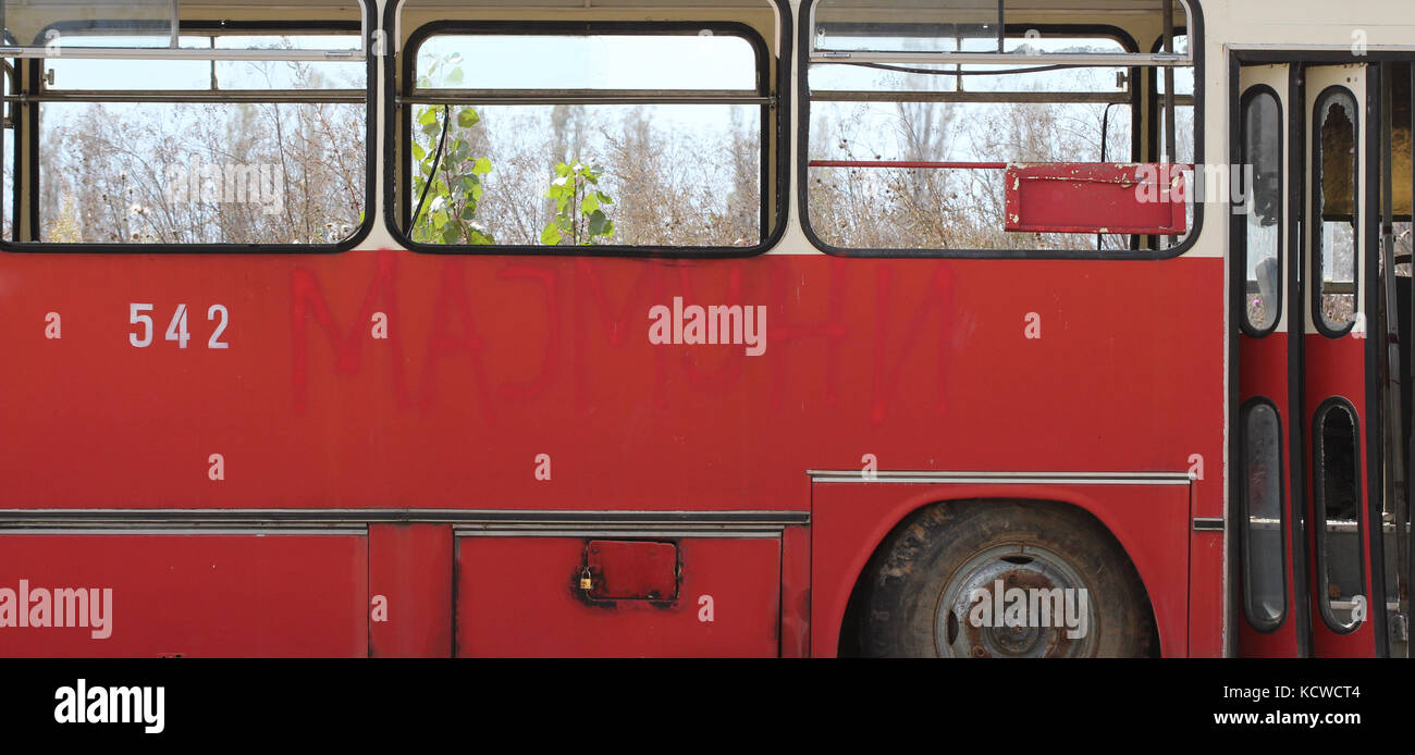 picture of a Old red bus, abandoned and rusty Stock Photo - Alamy
