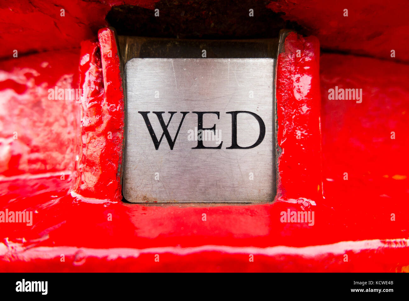 Day of the week letter collection plate / next collection sign on a red ...