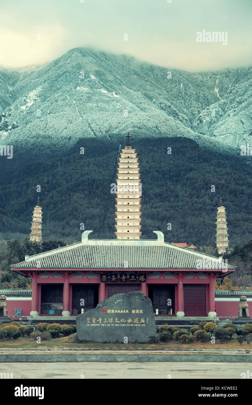 Ancient pagoda in Dali Chongsheng Monastery with snow capped Mt ...