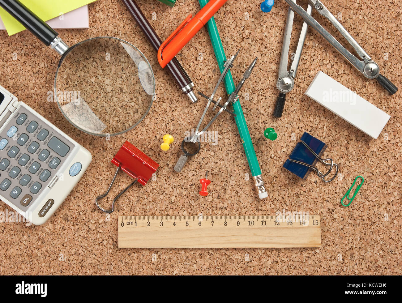 stationery in a mess on the table Stock Photo - Alamy
