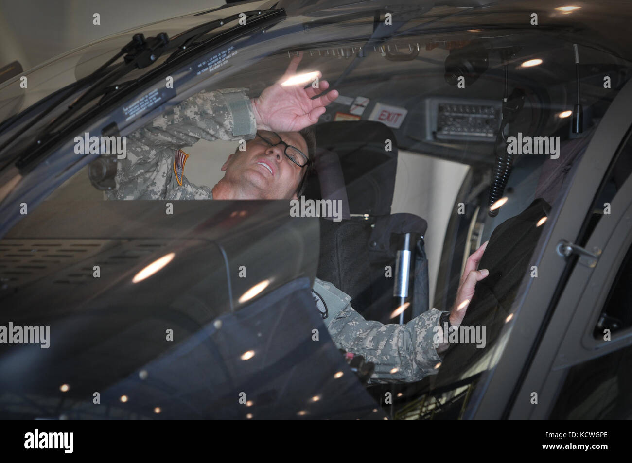 U.S. Army Maj. Brian Vorse, Warrant Officer Donald Dingeldein, and ...