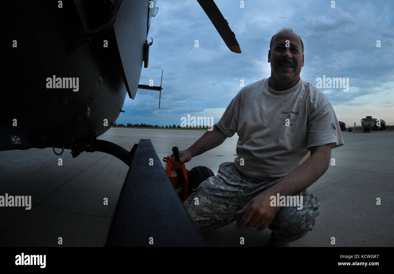 U.S. Army Maj. Brian Vorse, Warrant Officer Donald Dingeldein, and ...