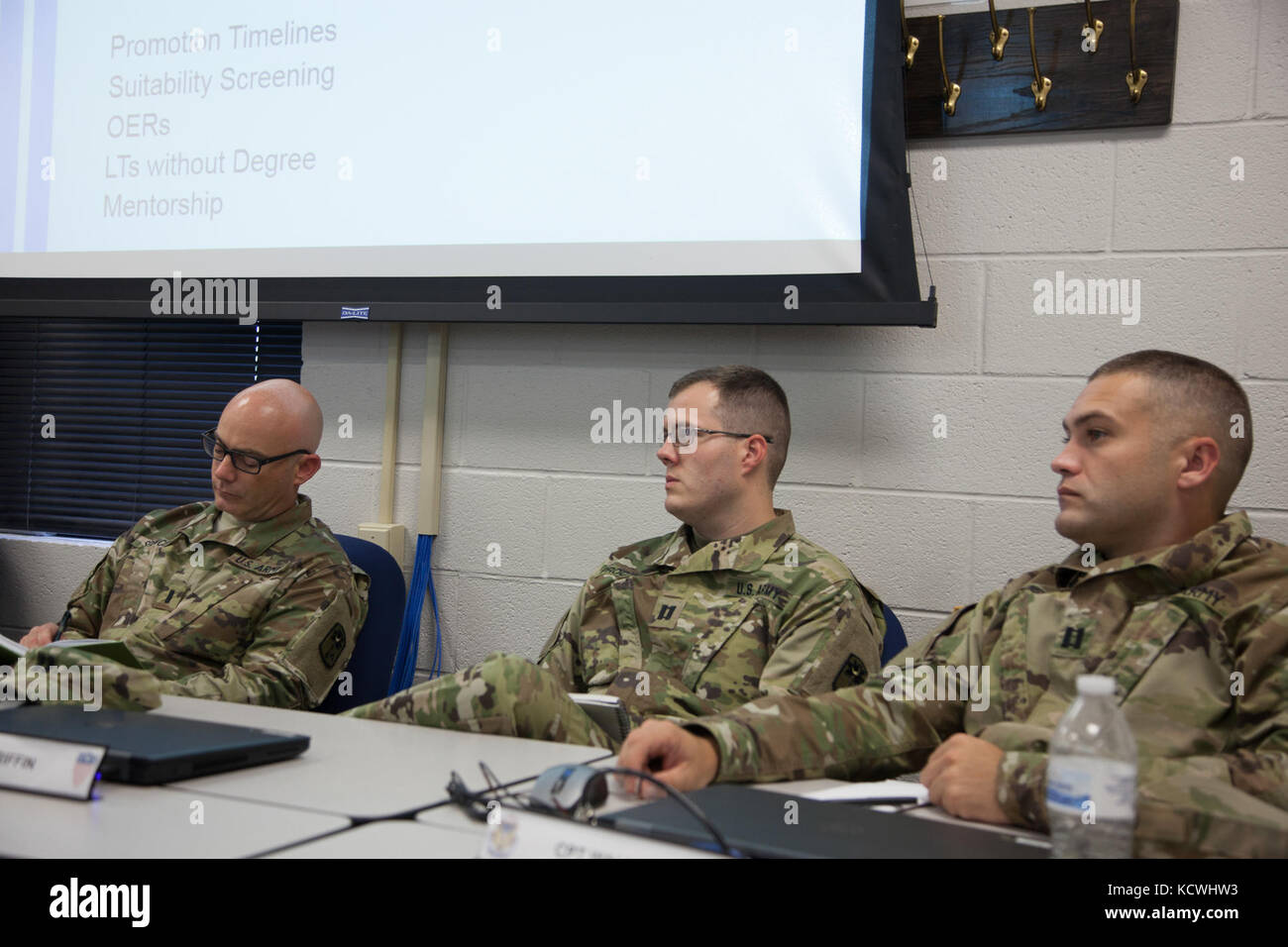 Attendees participate in briefings and work groups during the TAG ...
