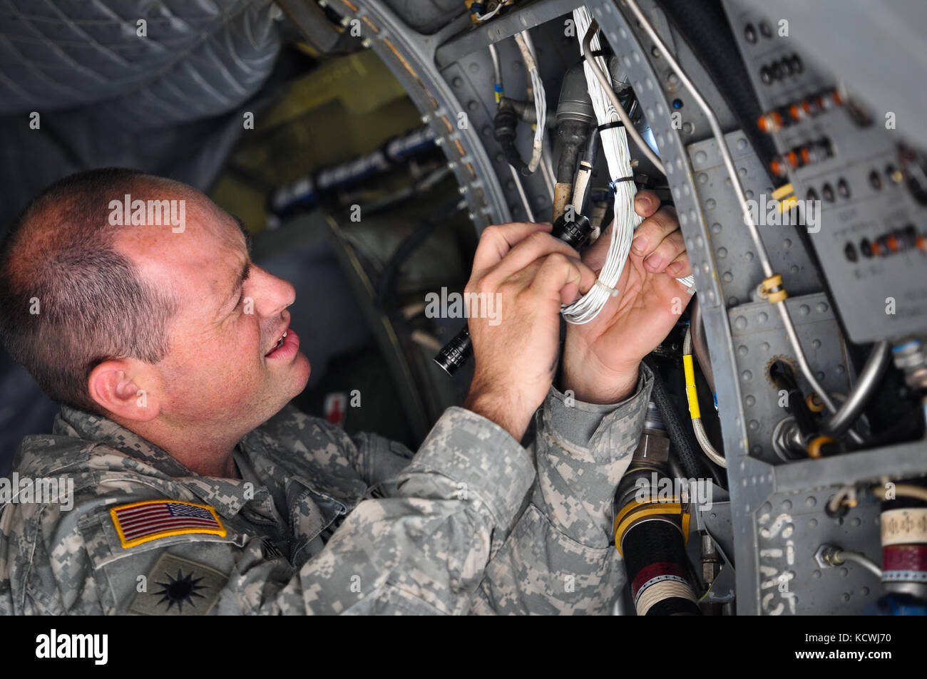 S.C. Army Soldiers perform pre-flight maintenance, test flight, and ...