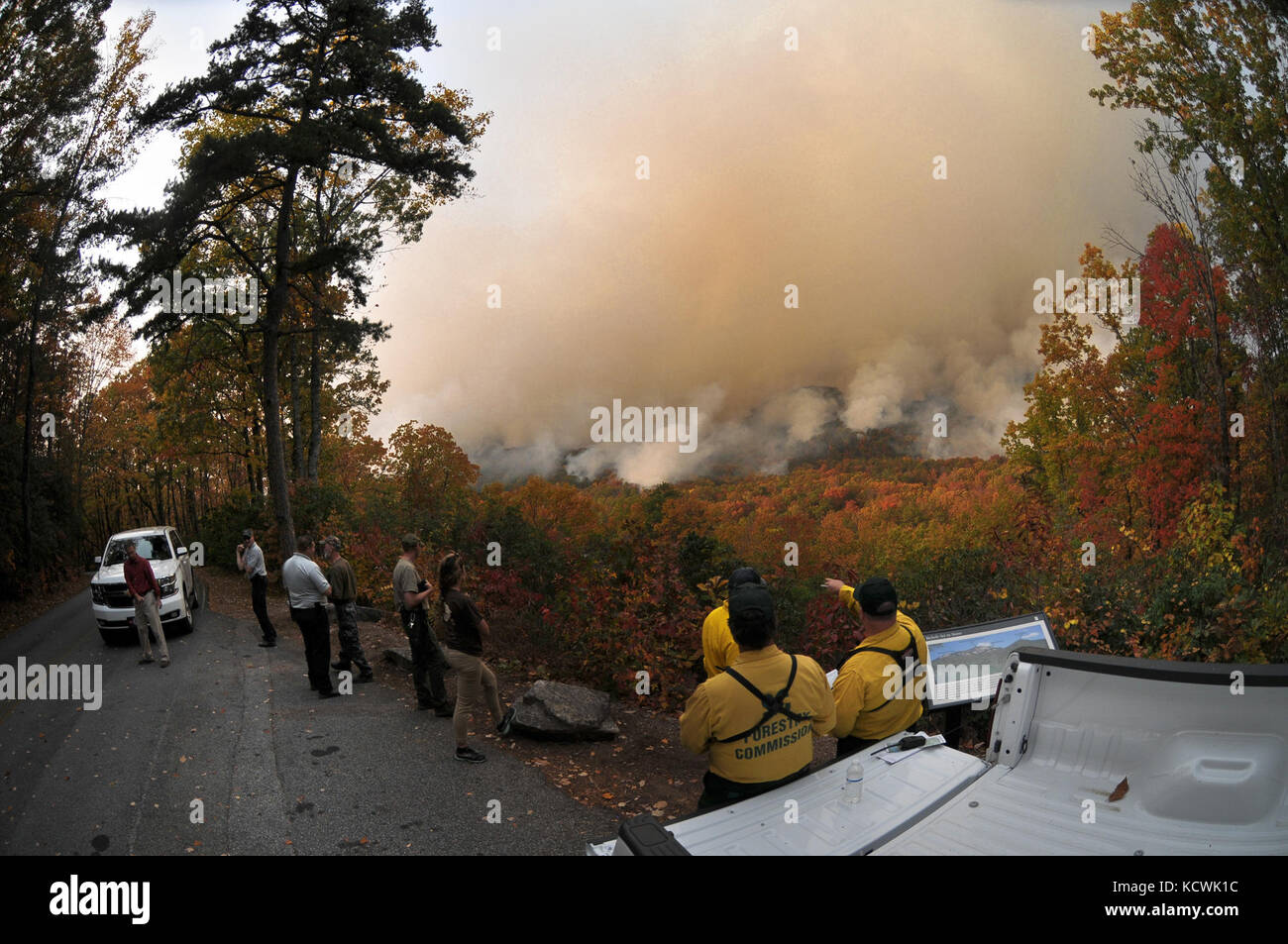 South Carolina Forestry Commission spotters observe the wildfires on Pinnacle Mountain. The ...