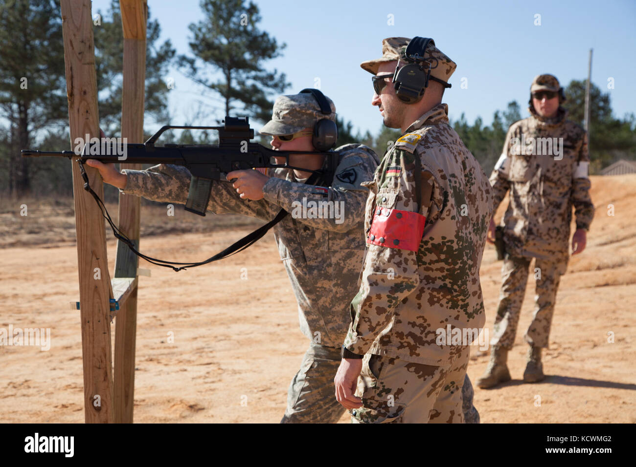 German Armed Forces Sgt. Kamil Hava observes U.S. Army Sgt. Matthew ...