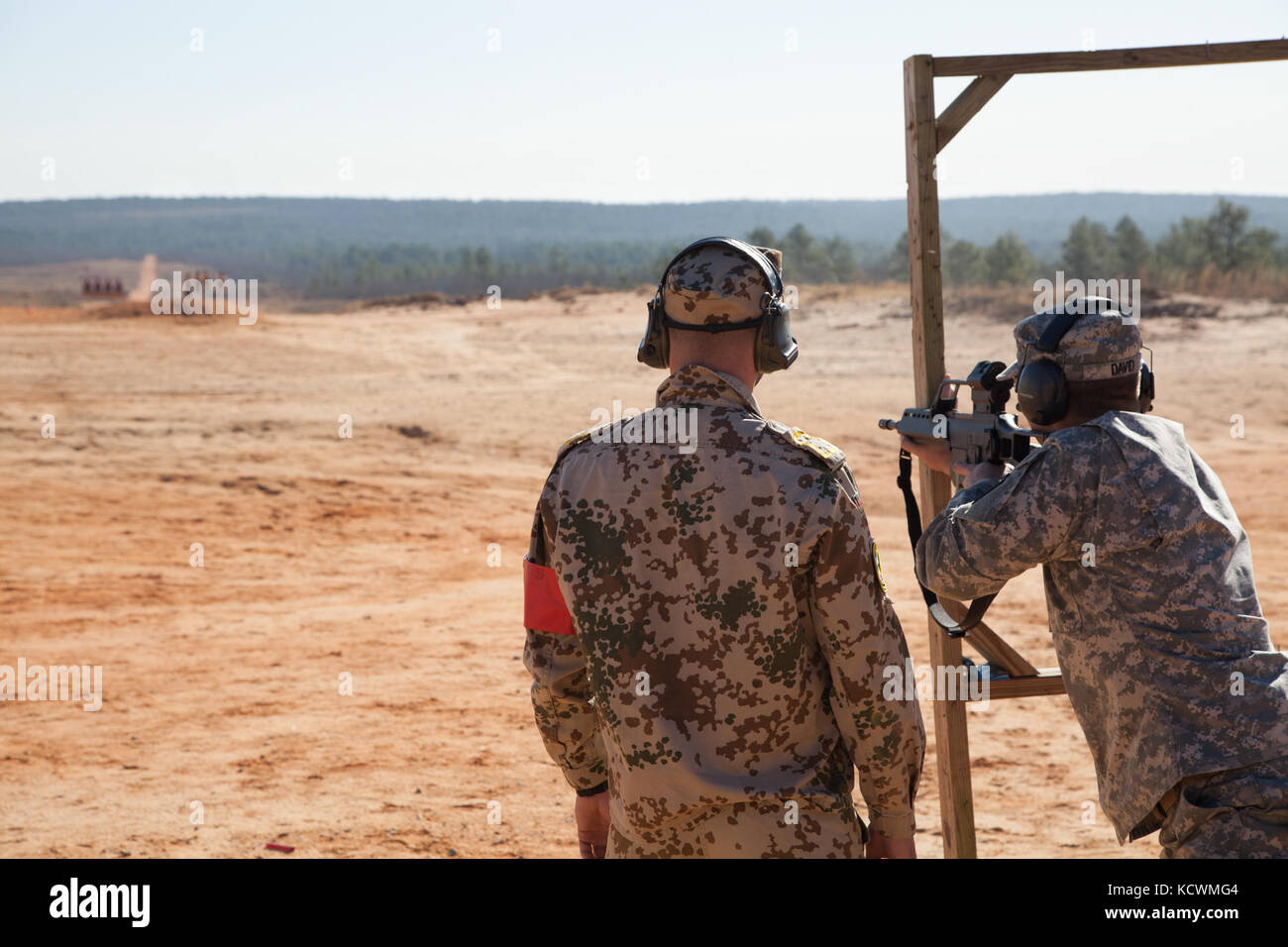 German Armed Forces Sgt. Kamil Hava observes U.S. Army Sgt. Matthew ...