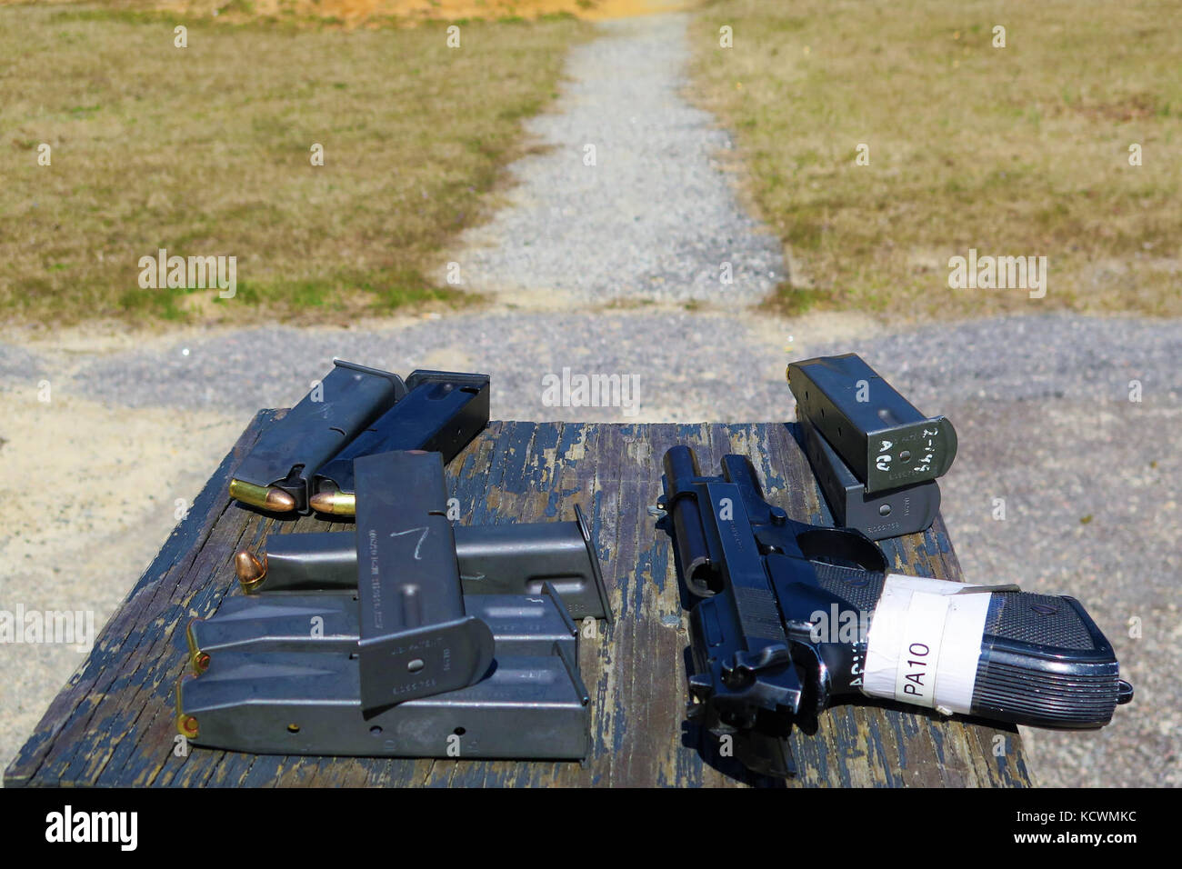 A 9mm M9 pistol sits ready to be loaded and fired during a range ...