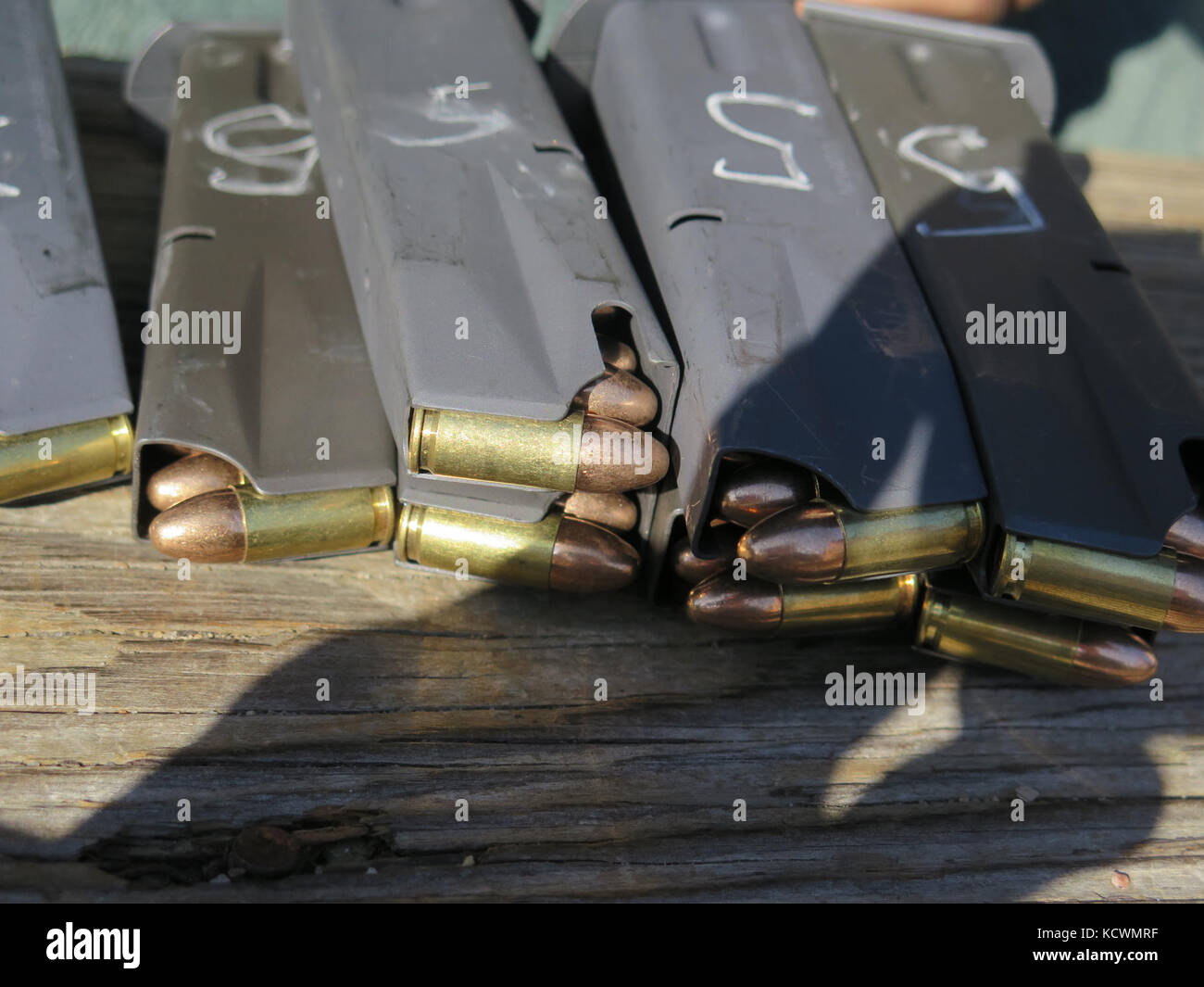 9mm magazines are loaded and ready for use at a qualification range. U ...