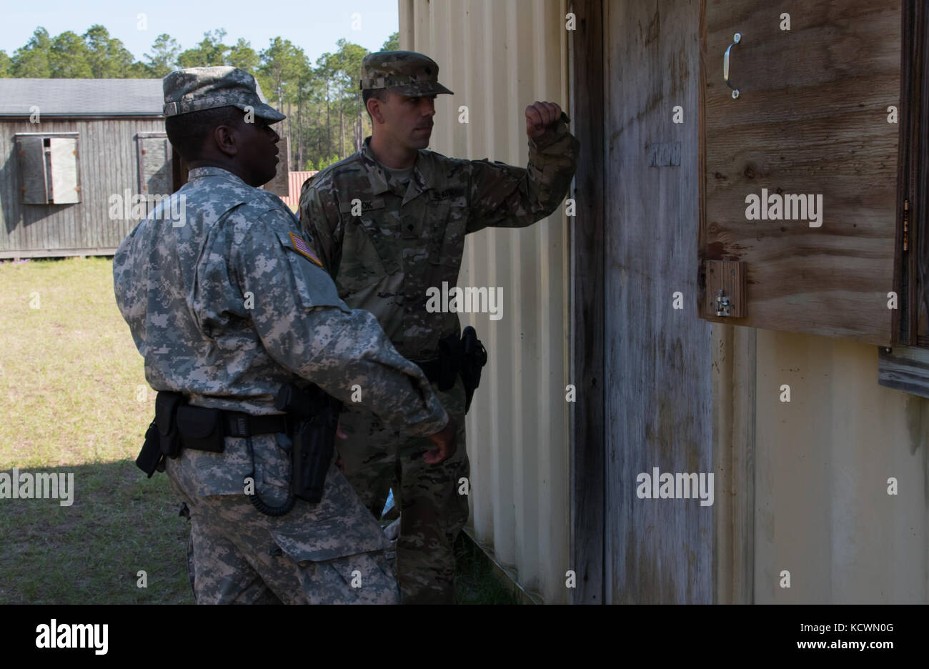 U.S. Army Spc. Jeremy Cook and partner Pvt. Damein Adams from the South ...
