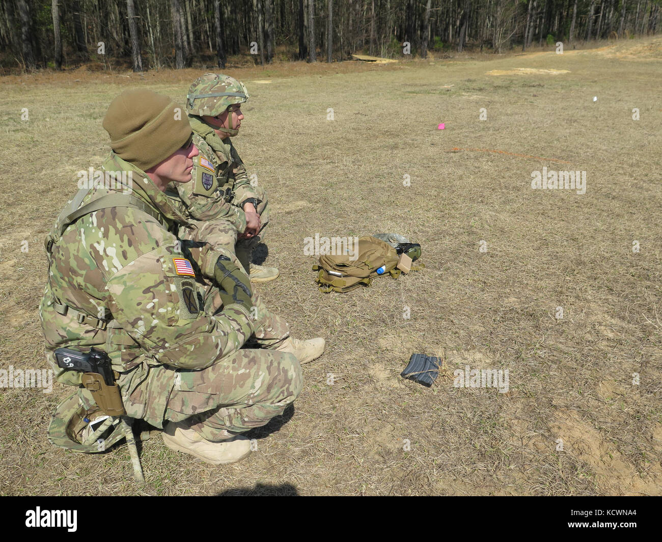 U.S. Soldiers in the South Carolina Army National Guard observe an M9 ...