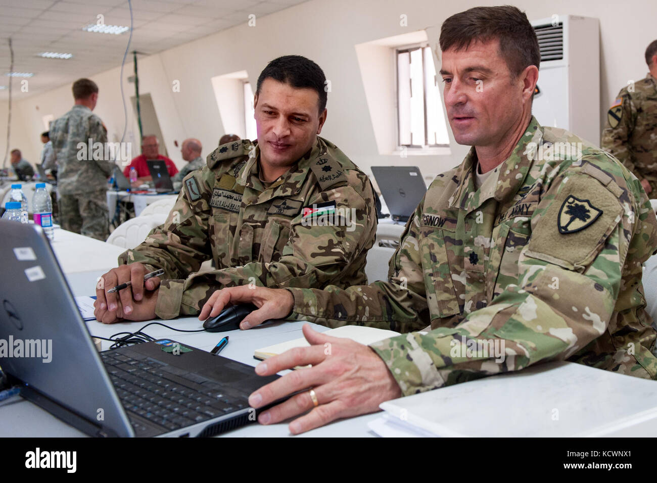 U.S. Army Lt. Col. Kenneth Snow works with his Jordanian Armed Forces ...