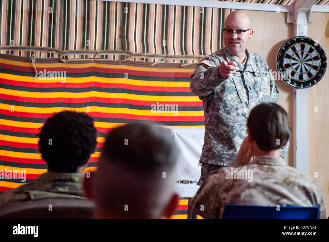 U.S. Army Chaplain, 1st Lt. Richard Brown, leads a Sunday religious ...