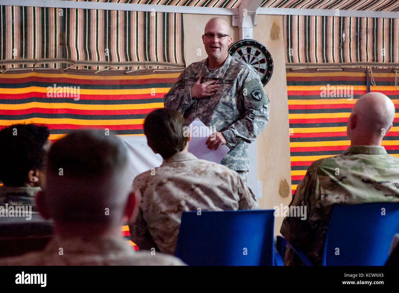 U.S. Army Chaplain, 1st Lt. Richard Brown, leads a Sunday religious ...
